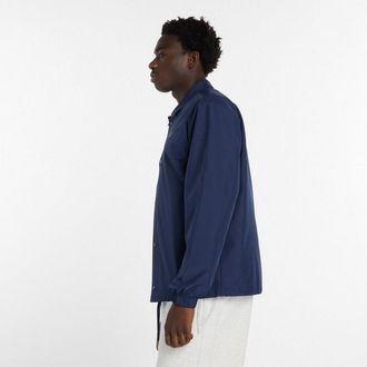 New Balance Kurzjacke TNV Mens Lifestyle Jacket mit Grafikprint, &Uuml;bergangsjacke f&uuml;r Fr&uuml;hling und Herbst, aus Polyester