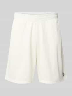Review Shorts aus Mesh mit Logo-Print