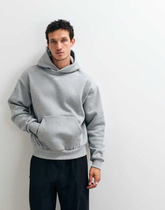 Nike Solo - Oversize-Kapuzenpullover aus Fleece in Grau mit mittigem Swoosh-Logo