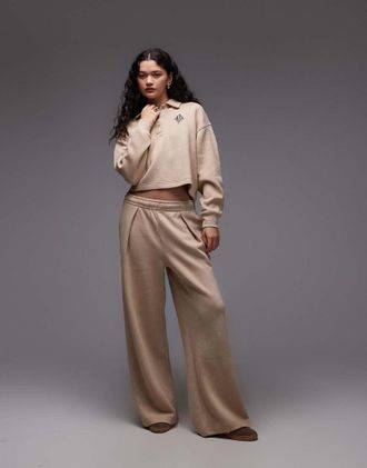 Lacoste Jogginghose in Beige mit weitem Bein-Neutral
