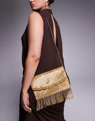 True Decadence Mit Quasten verzierte Kuvert-Clutch in Goldoptik-Goldfarben