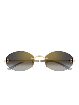 Cartier lunettes de soleil &agrave; monture ronde - Or