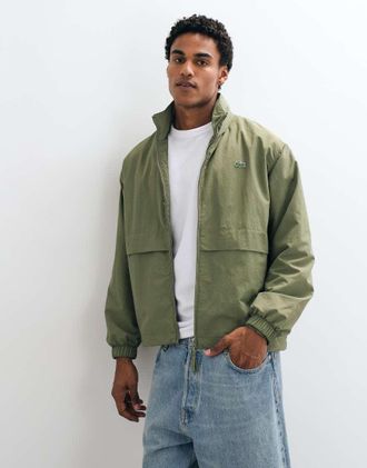 Lacoste veste coupe-vent d&eacute;perlante kaki-Vert