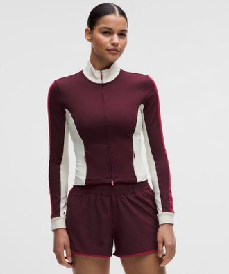 lululemon Veste de surv&ecirc;tement ray&eacute;e coupe slim pour Femmes - Burgundy/Rouge - Taille XL