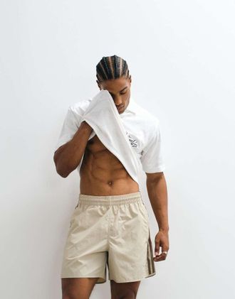 adidas Originals Short de course &agrave; 3 bandes - Kaki clair-Vert
