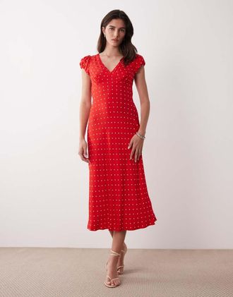 Nobody's Child Lina - Robe mi-longue fluide &agrave; pois avec mancherons et col V - Rouge