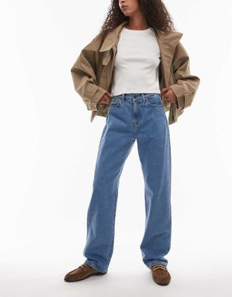 Carhartt Work in Progress Noxon - Gerade geschnittene Jeans in gebleichter Stone-Waschung mit hohem Bund-Blau