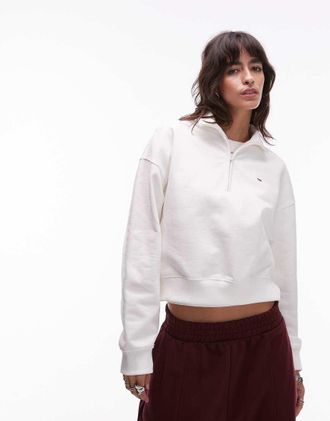 Tommy Jeans Kastiges Sweatshirt in Ecru mit kurzem Reißverschluss und Flag-Logo-Bunt