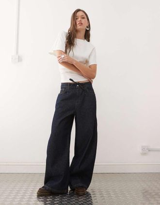 Reclaimed Vintage Weite Baggy-Jeans aus Denim in Indigoblau mit Bindedetail, Kombiteil