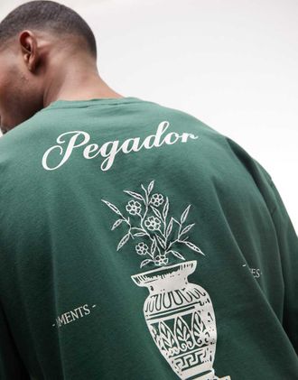 Pegador Pegador - Morcote - Oversize-T-Shirt in verwaschenem Gr&uuml;n mit Grafikprint auf dem R&uuml;cken
