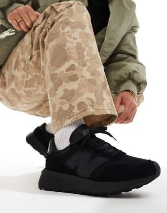 New Balance 370 - Sneaker in Triple-Schwarz