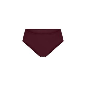 SKIMS Culotte mi-haute unie sans coutures
