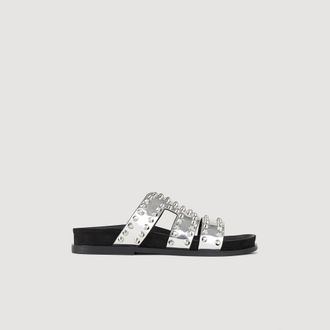 Sandro Flache Sandalen mit Nieten